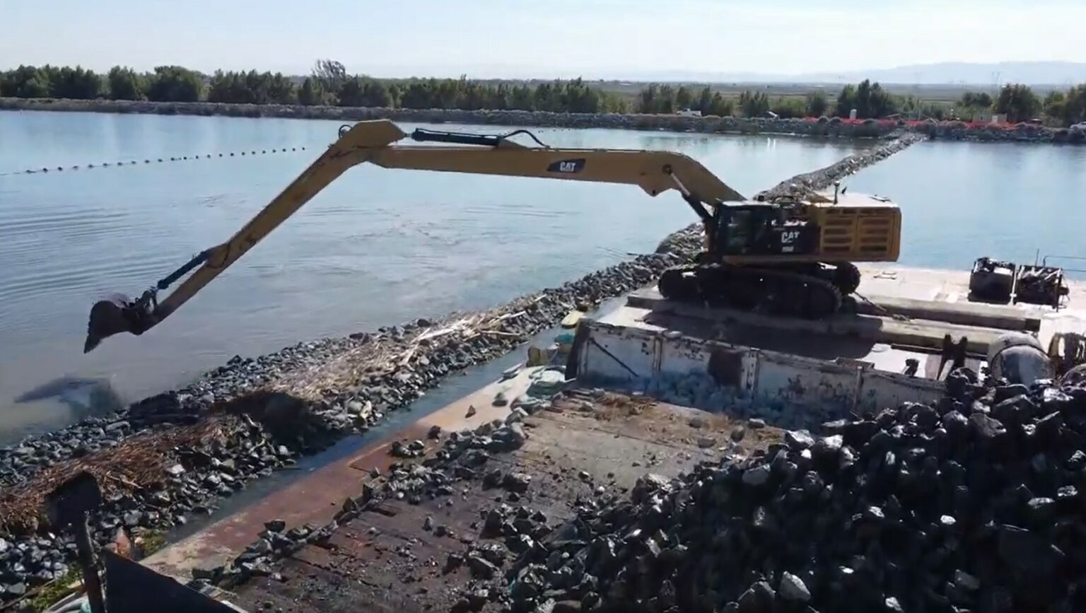Kiewit removes rock barrier across West False River - Dredging Today